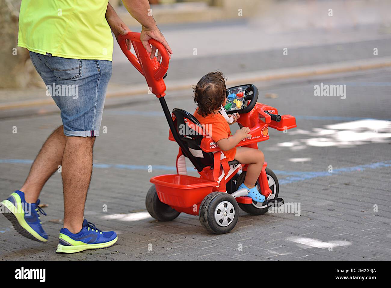 Child in a scroller | Enfant dans une poussette 10/07/2018 Stock Photo ...