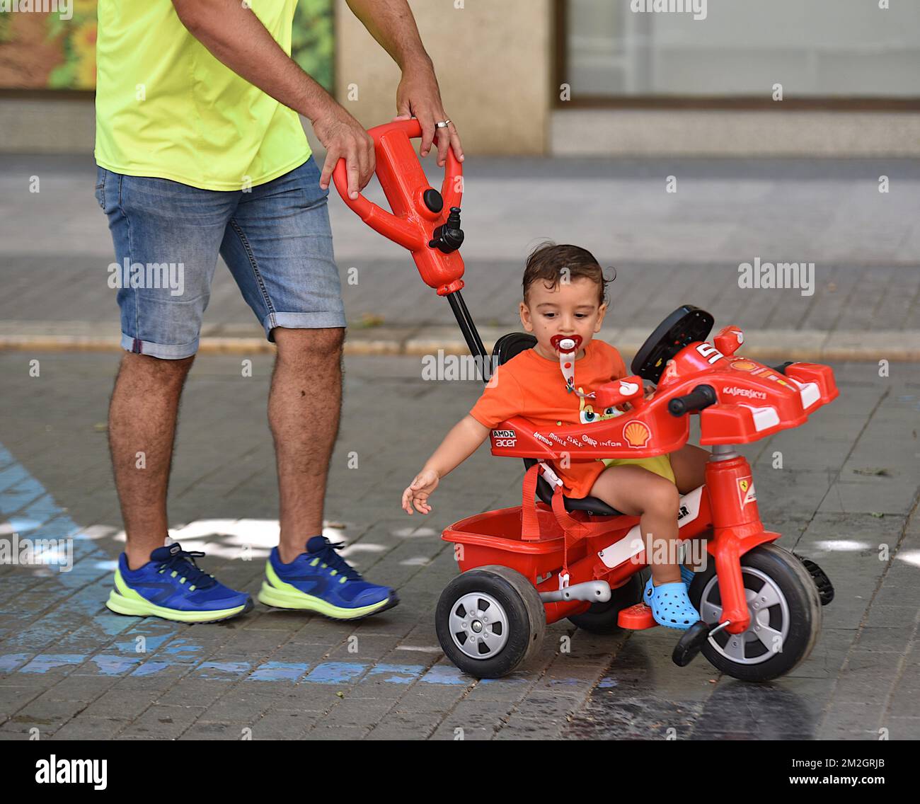Child in a scroller | Enfant dans une poussette 10/07/2018 Stock Photo ...