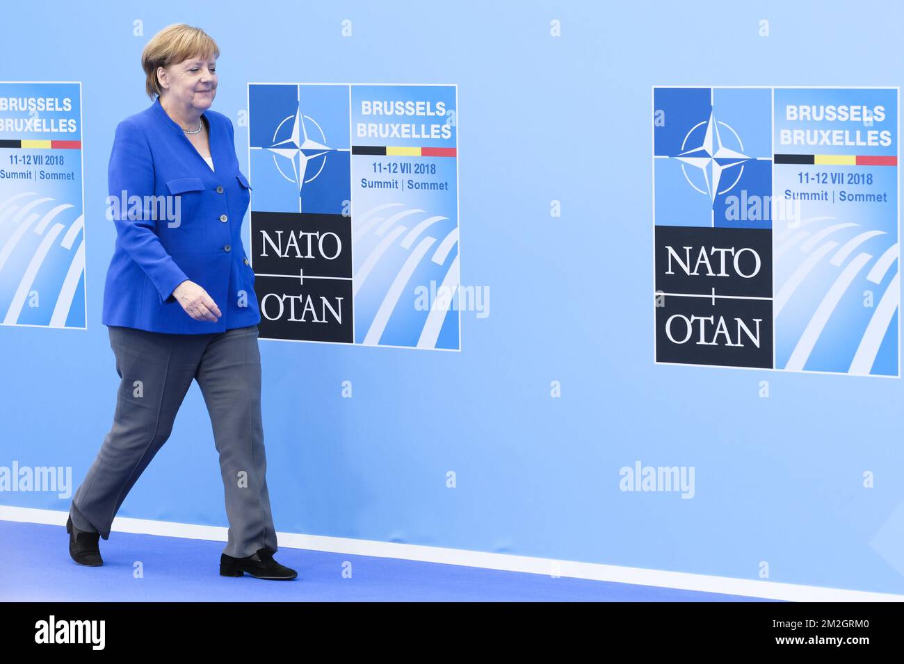 Chancellor of Germany Angela Merkel pictured at the handshake moment at ...