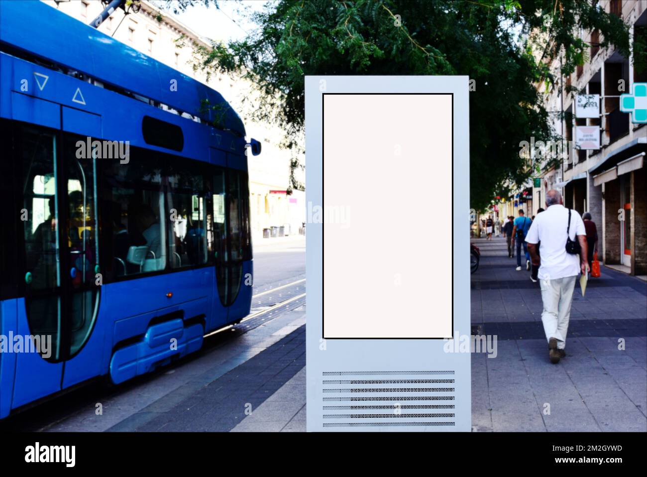 billboard and ad at busstop. blank white lightbox. urban setting. city ...