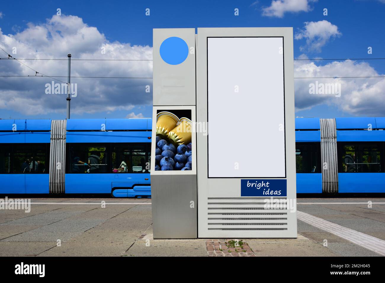 billboard and ad at busstop. blank white lightbox. urban setting. city ...