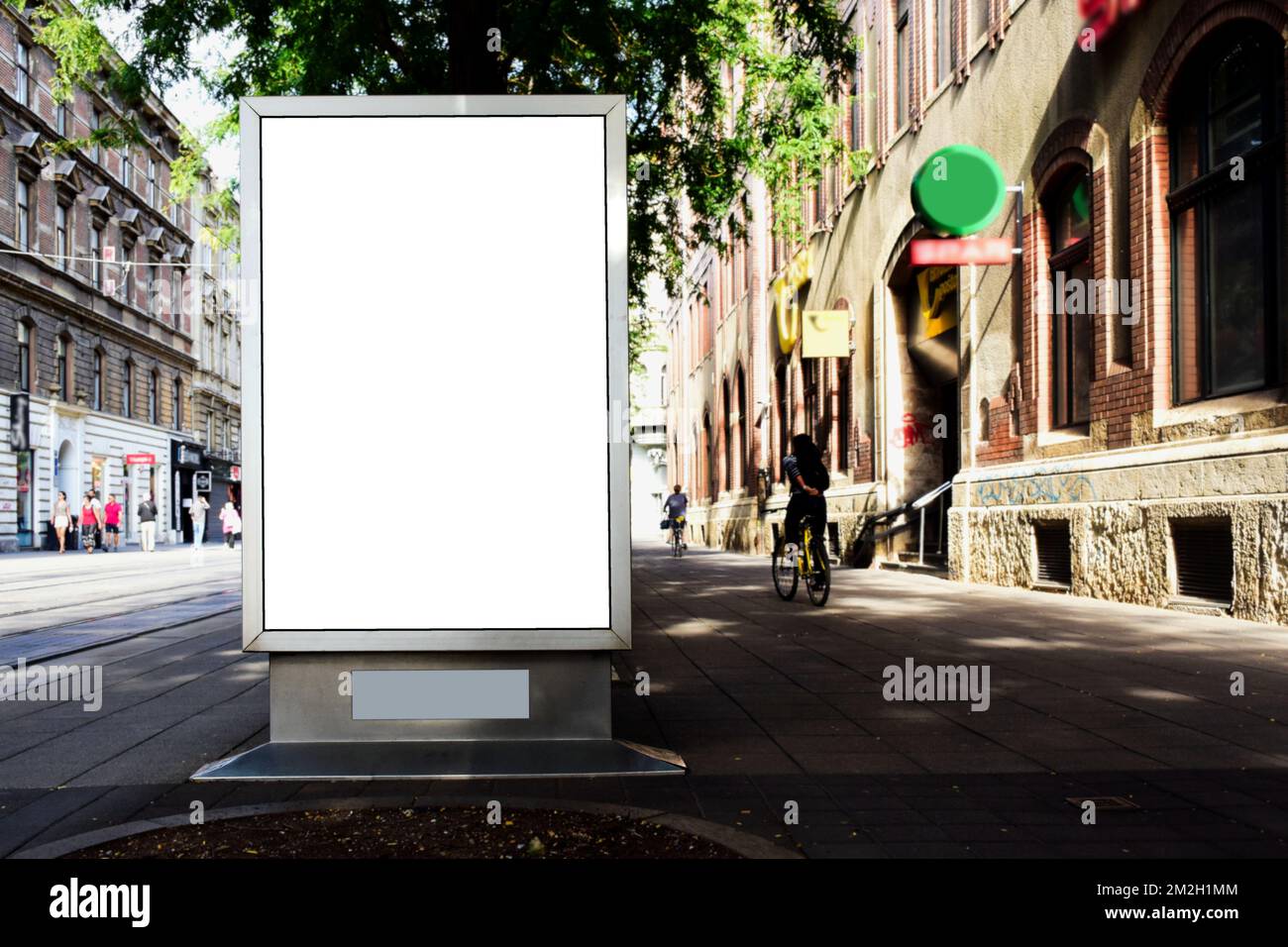 billboard ad at busstop. blank white lightbox. urban setting. city ...
