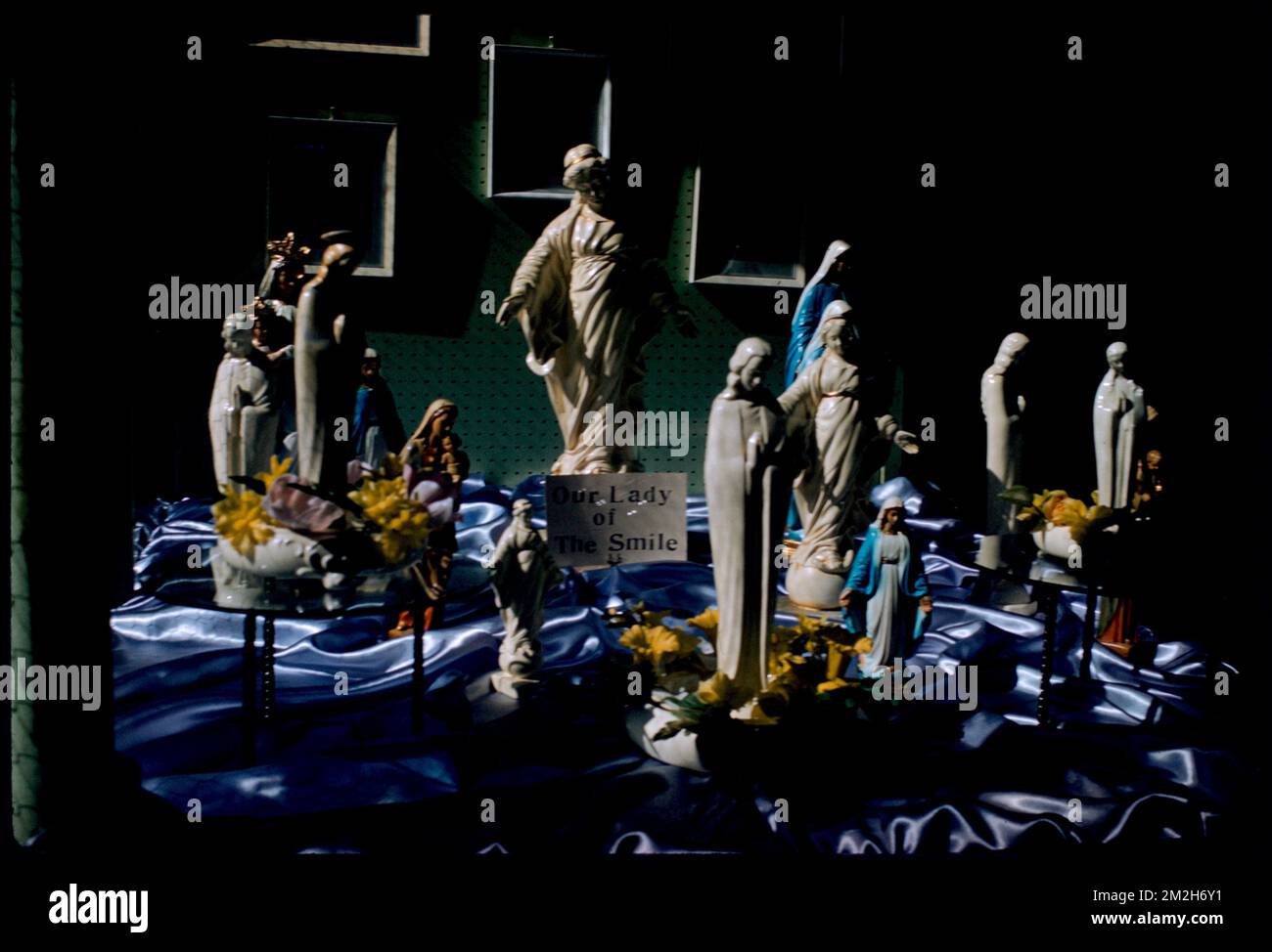 Display of religious figurines including Our Lady of the Smile, Boston ...