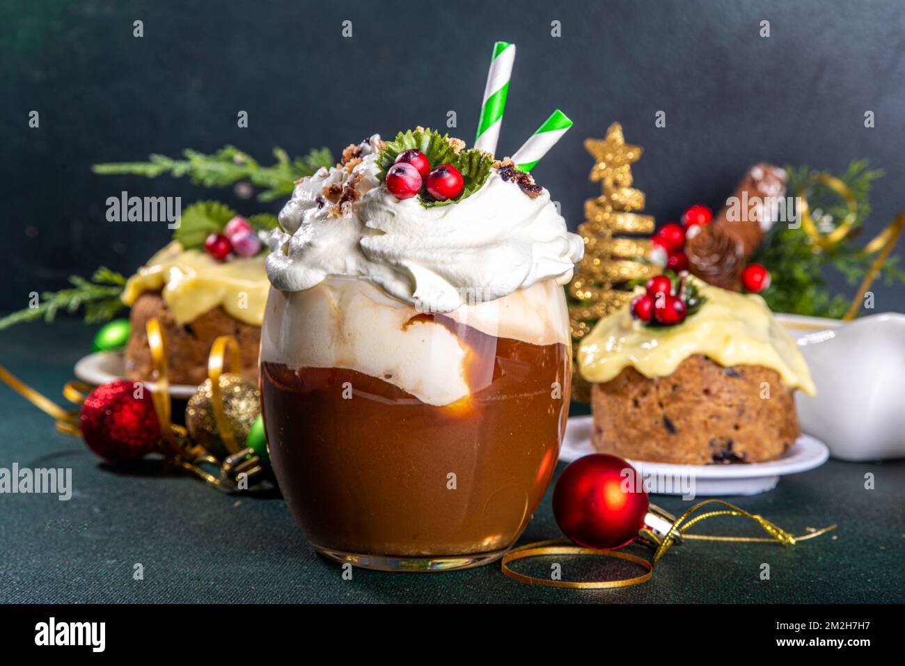 Christmas pudding latte. Sweet coffee drink with whipped cream, vanilla ...