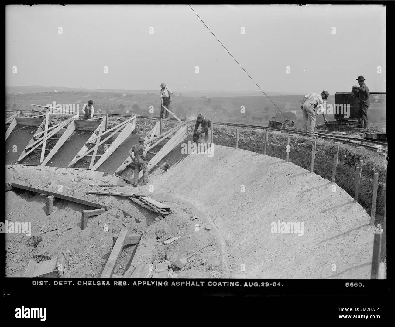 Distribution Department, Chelsea Reservoir, applying asphalt coating ...