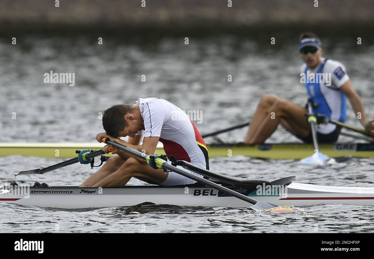 Belgian rower Ruben Somers looks exhausted after the B-final of the men ...