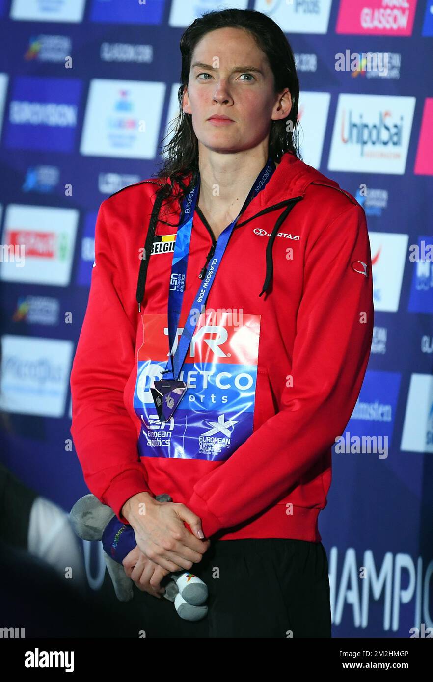 Belgian swimmer Kimberly Buys poses for the photographer with the brons ...