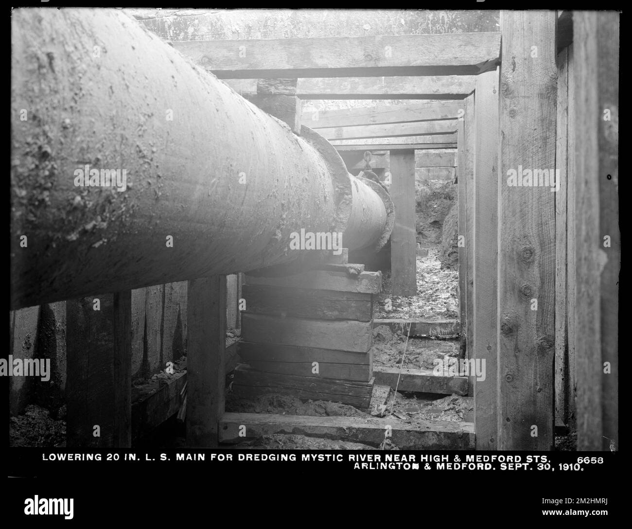 Distribution Department, Low Service Pipe Lines, lowering 20-inch main ...