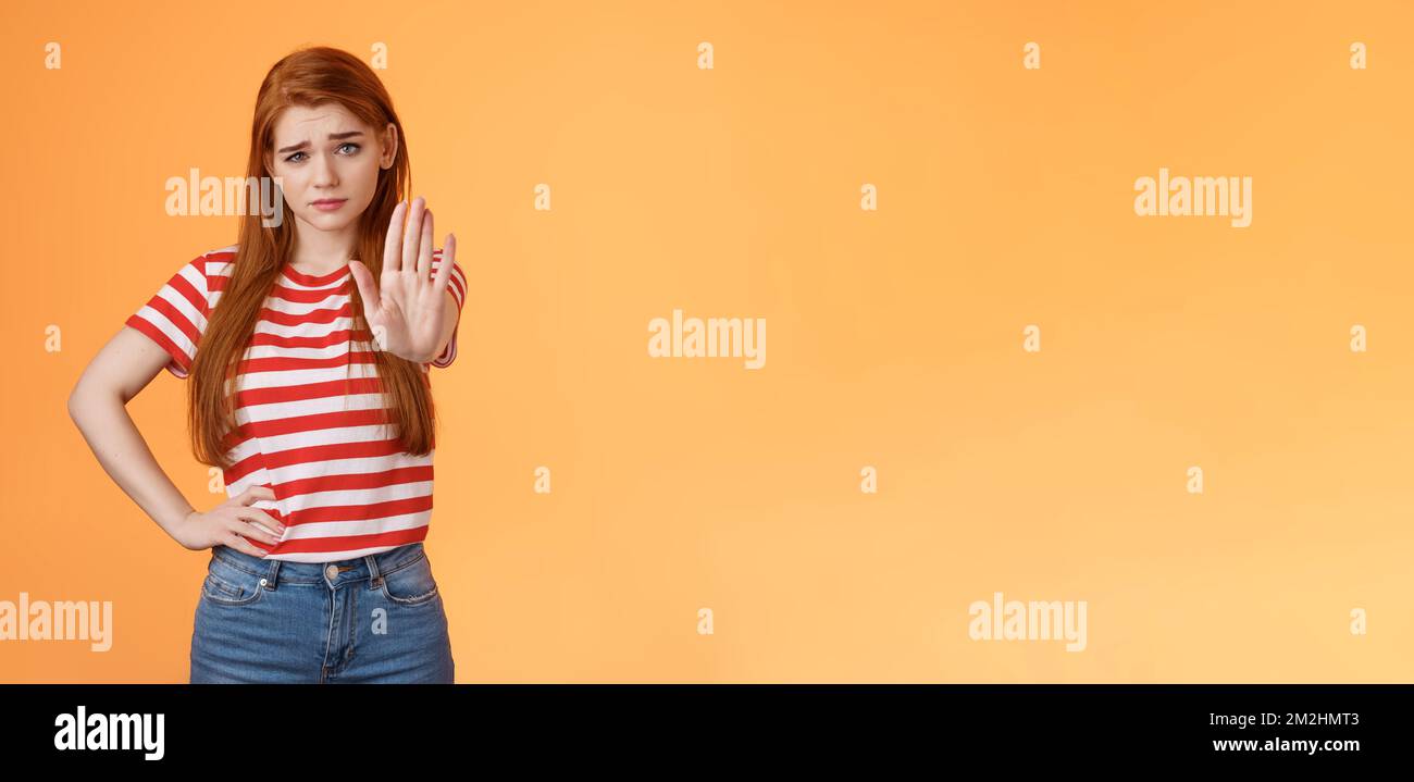 Time to stop. Serious-looking displeased bossy confident redhead girl ...