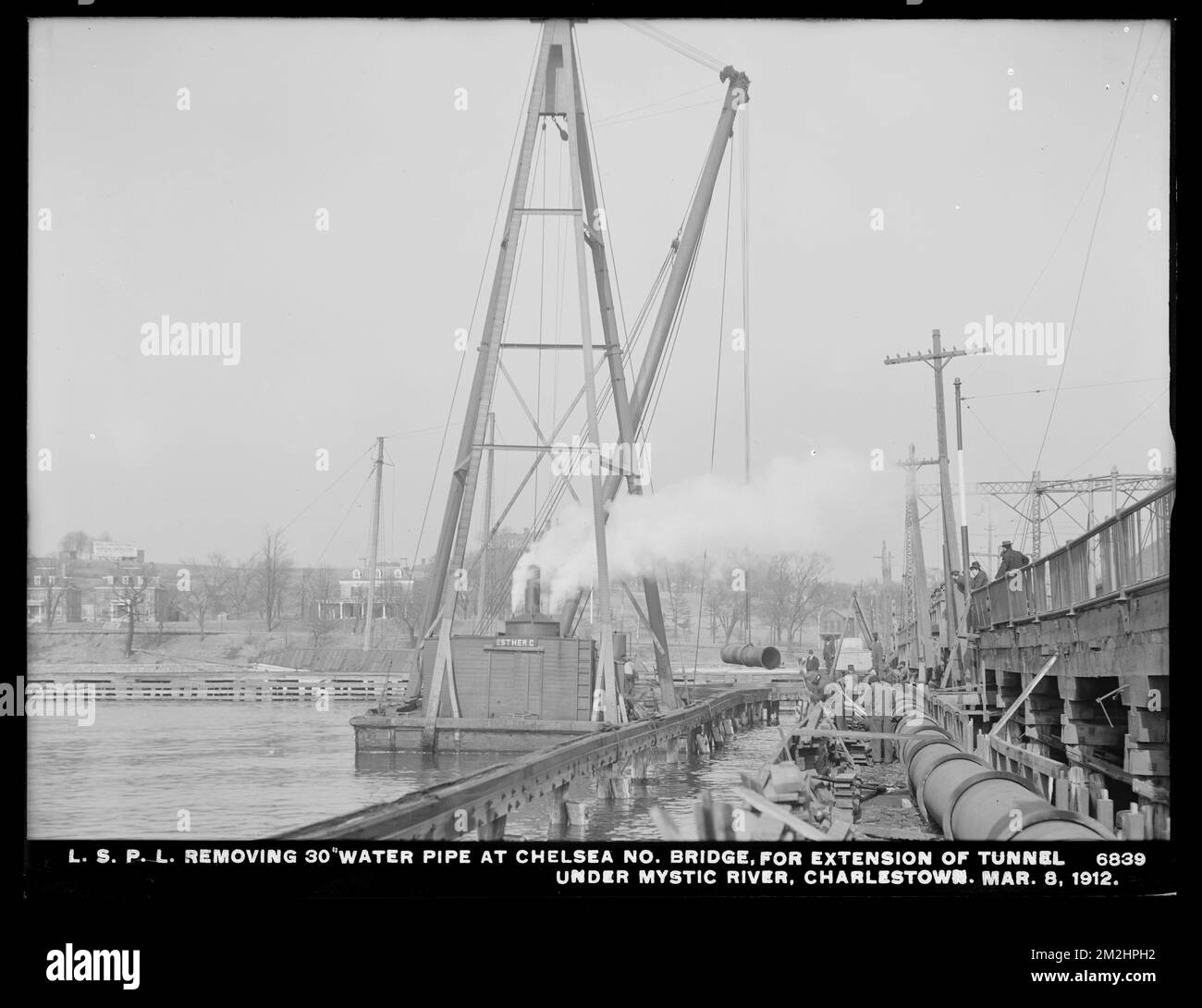 Distribution Department, Low Service Pipe Lines, removing 30-inch water ...