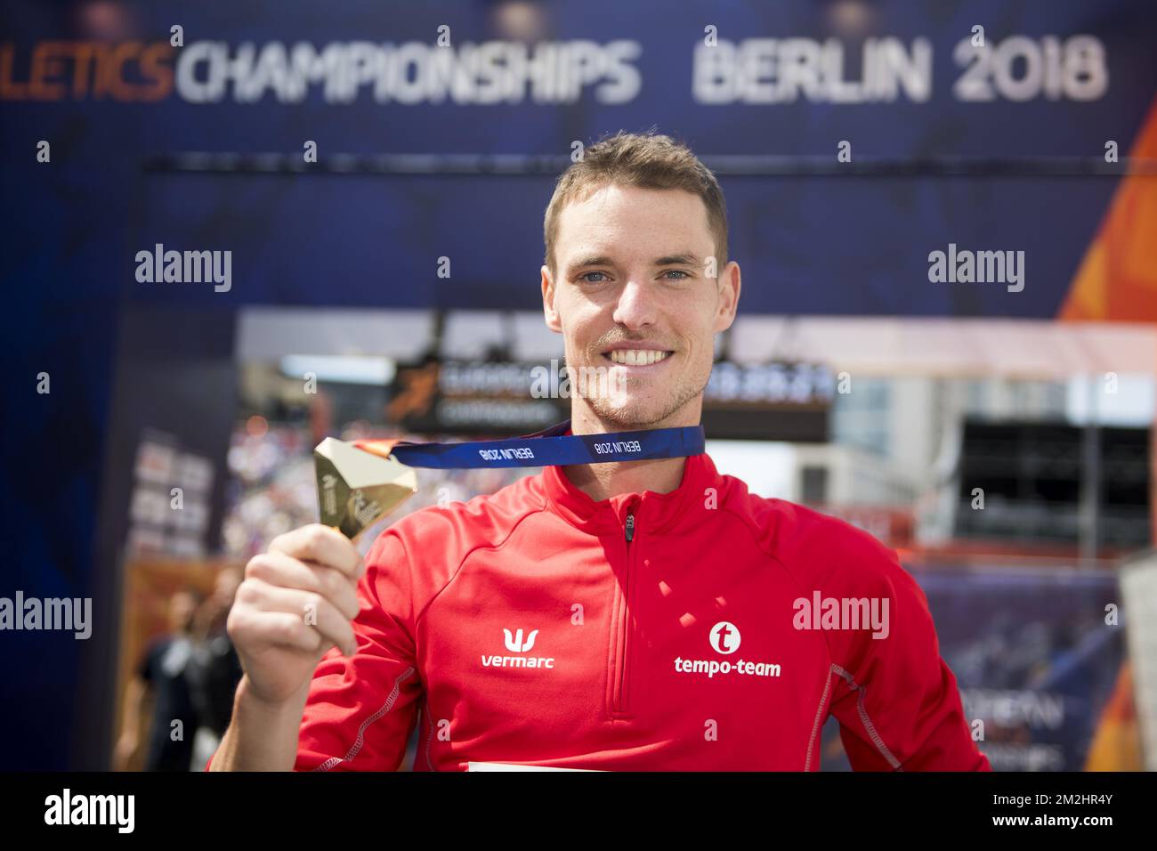 Belgian athlete Koen Naert poses for the press with his gold medal ...