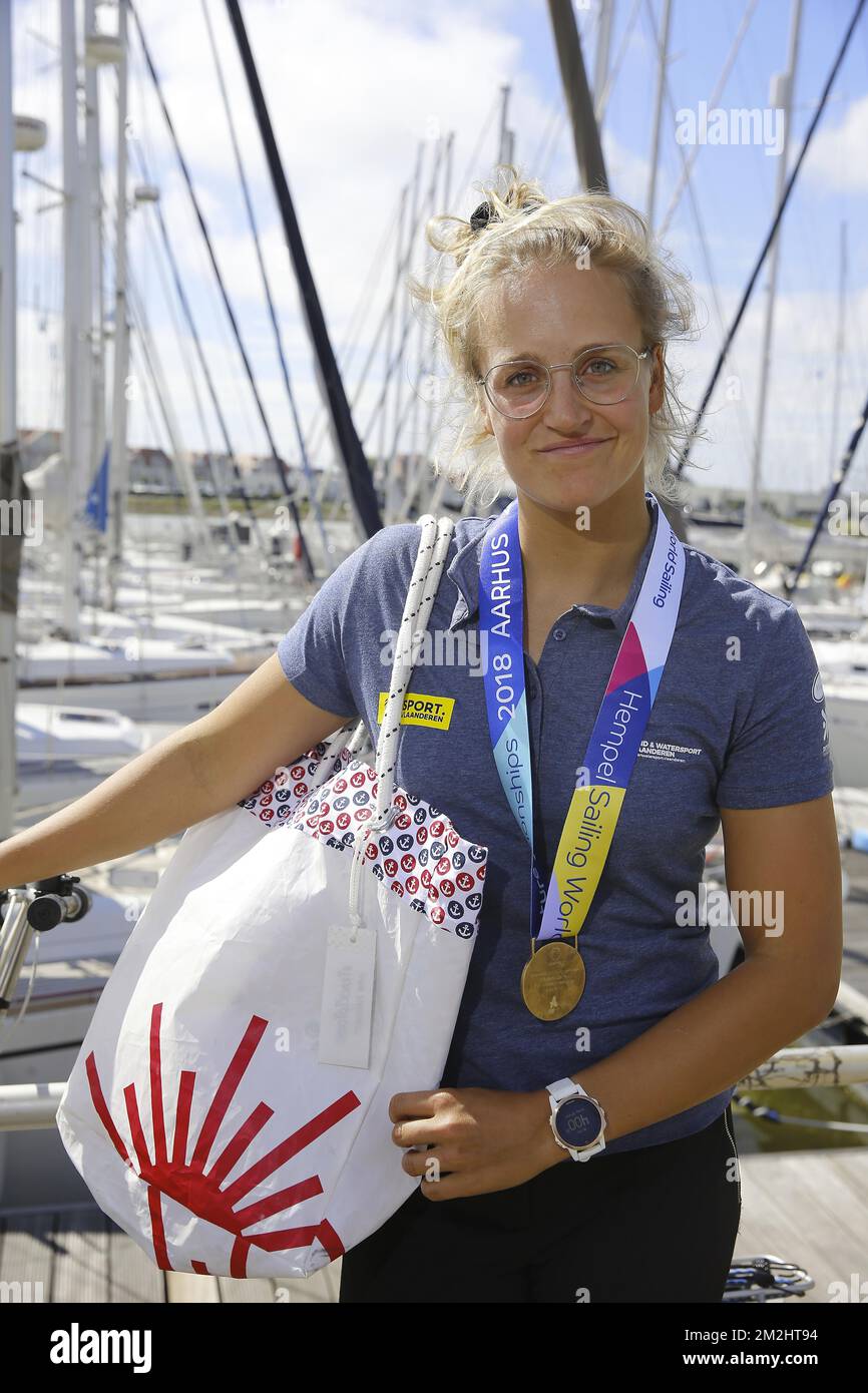 Belgian sailor Emma Plasschaert poses for the photographer at a press ...