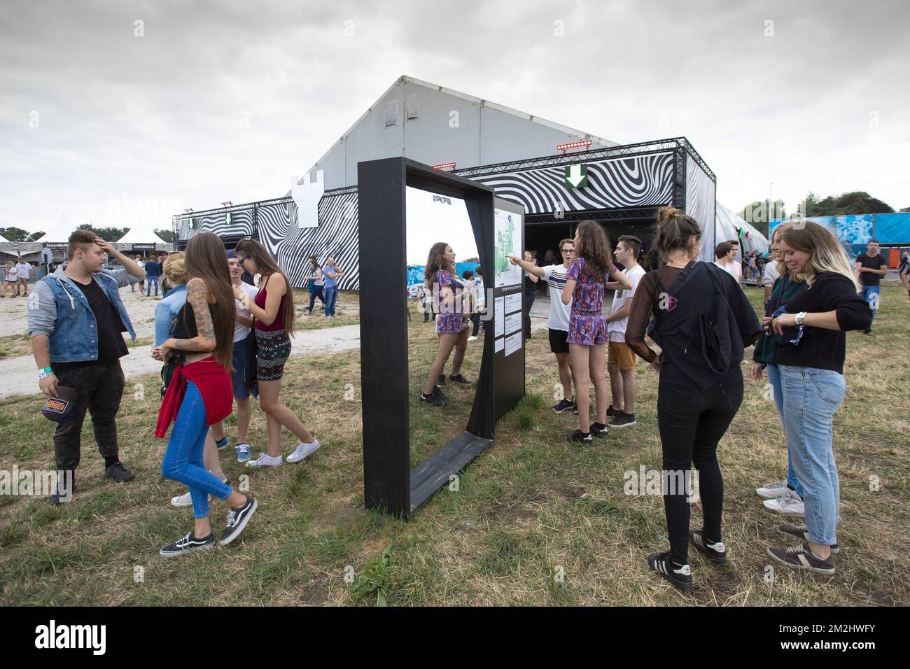 Illustration shows the first day of the four-days music festival ...