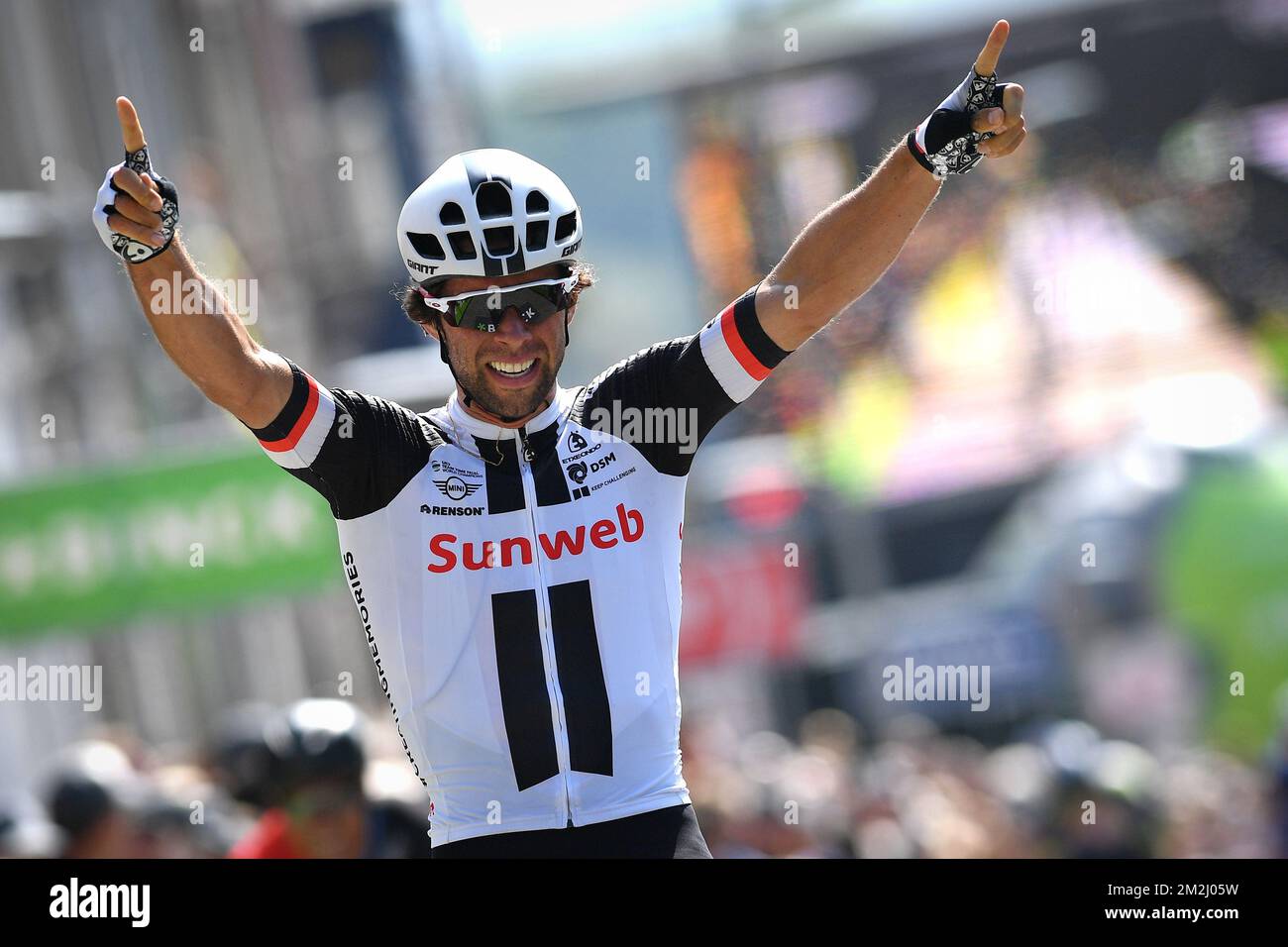 Australian Michael Matthews of Team Sunweb celebrates as he crosses the ...