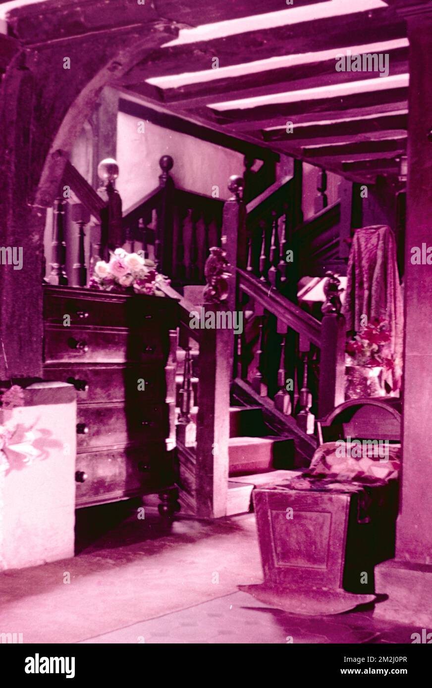 Red tone view of the stairway of St. Mary's House, Bramber, Sussex, UK ...