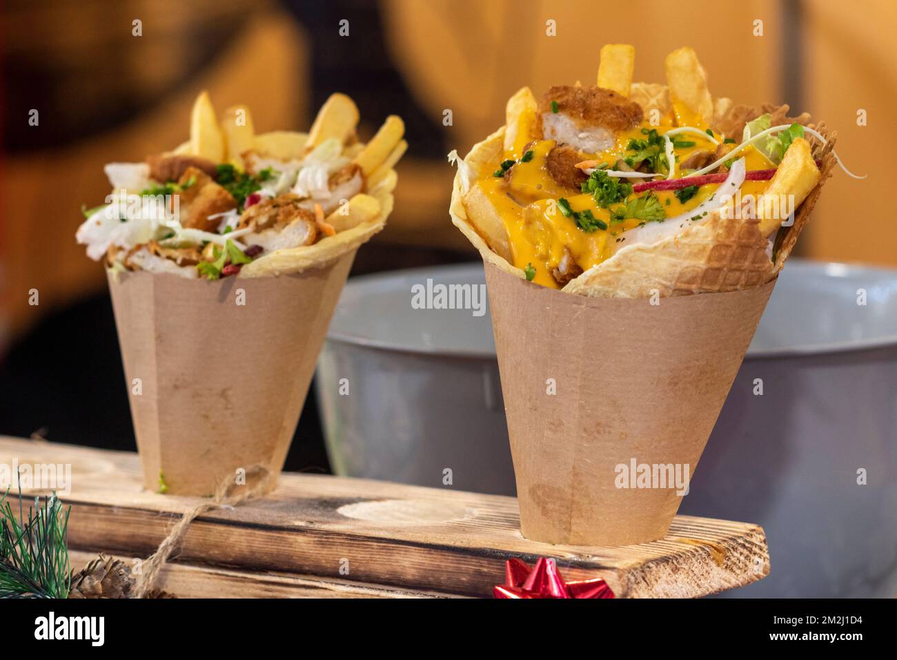 Delicious chicken and fries wrap street food with cheddar cheese sauce ...