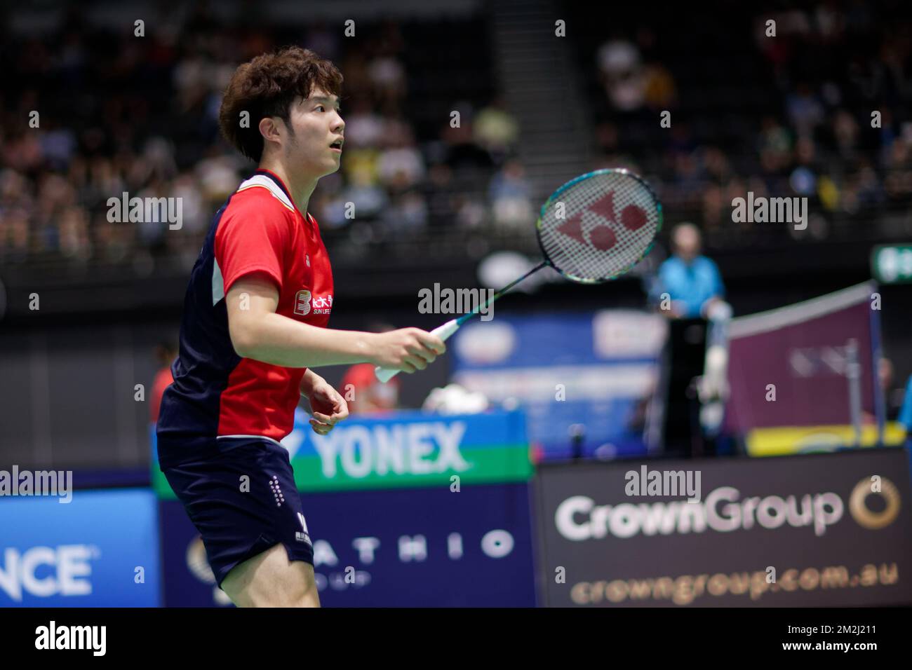 HE Ji Ting of China in action during the mens semi finals doubles match ...