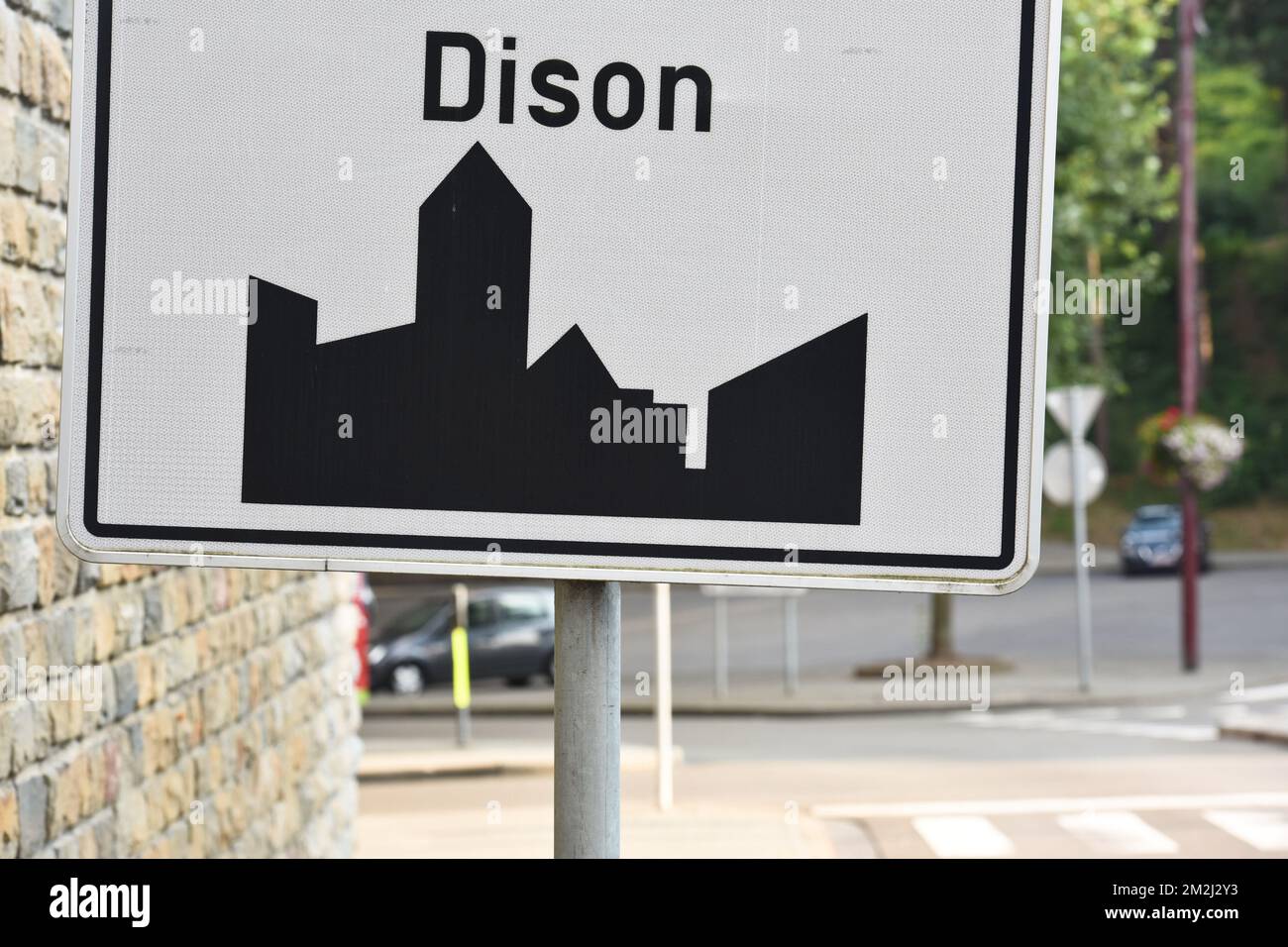 Illustration shows the name of the Dison municipality on a road sign ...