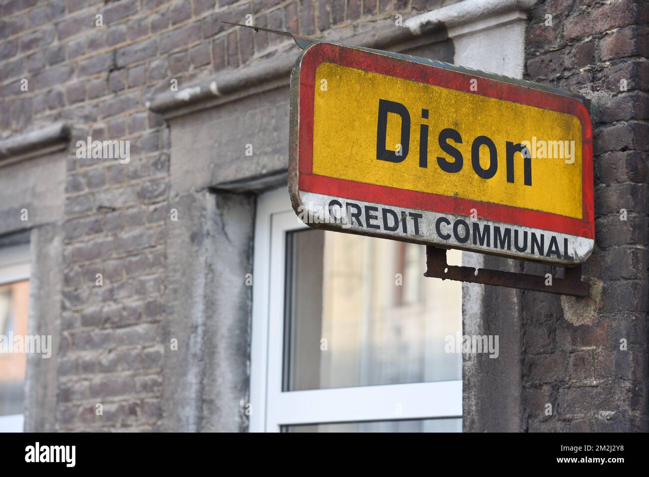 Illustration shows the name of the Dison municipality on a road sign ...
