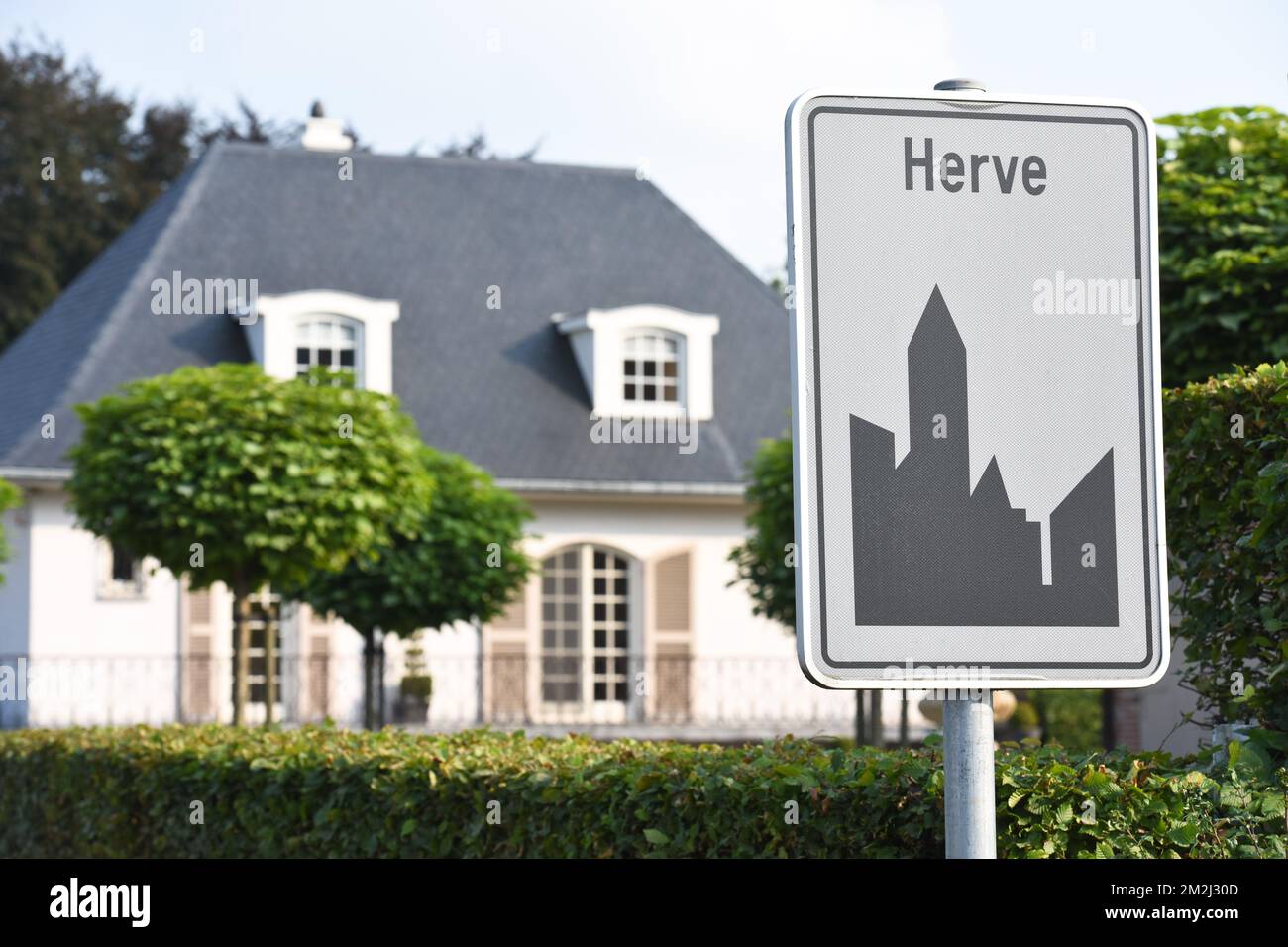 Illustration shows the name of the Herve municipality on a road sign ...