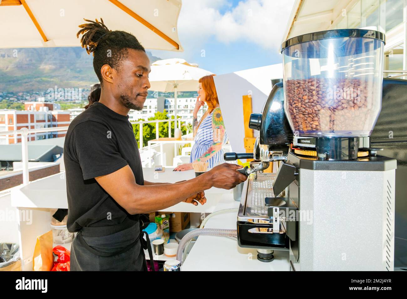 Cape Town, South Africa - November 15, 2022: African Male barista ...
