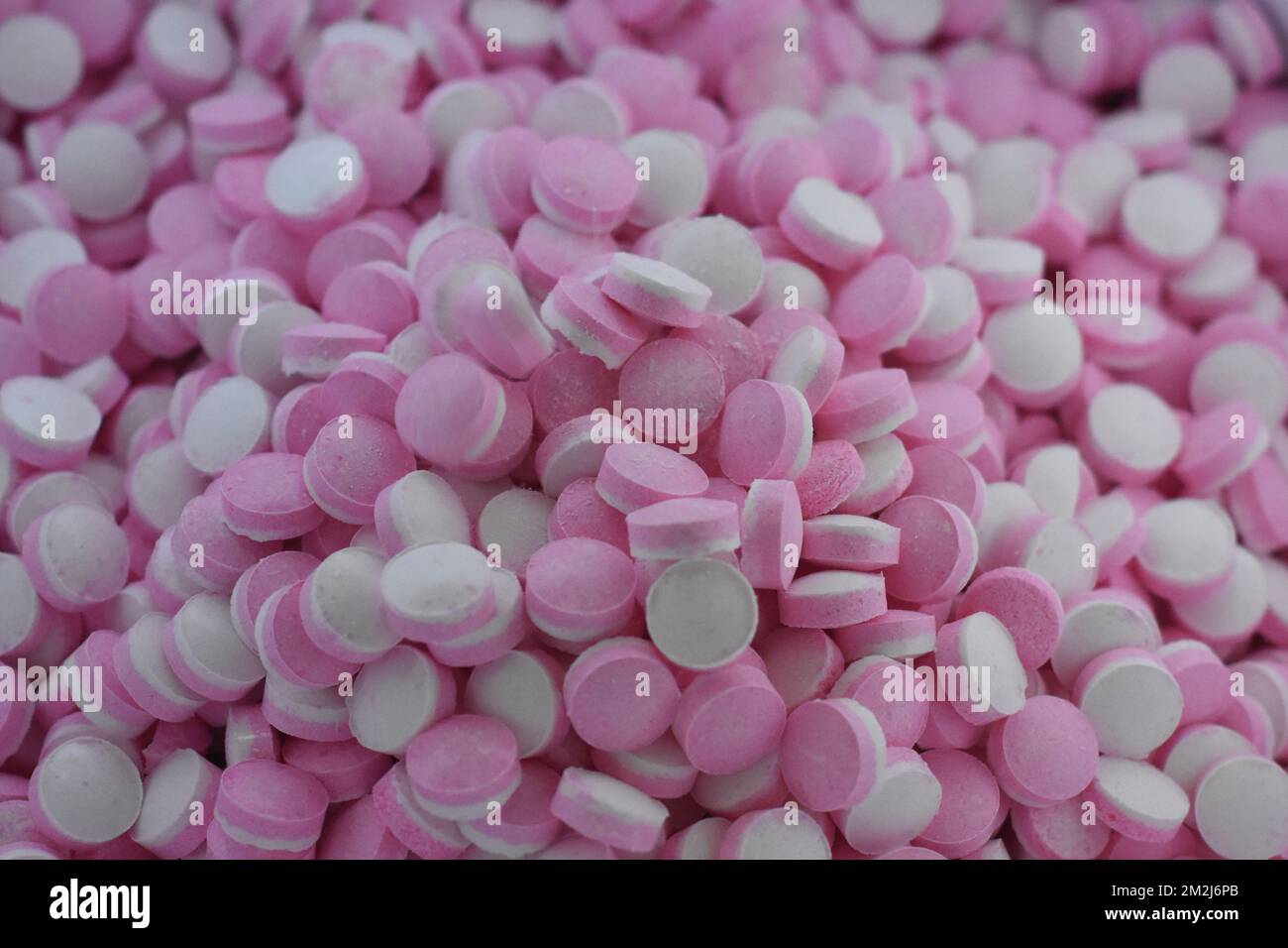 Non Exclusive: Traditional mints of pink, blue and yellow colors with ...