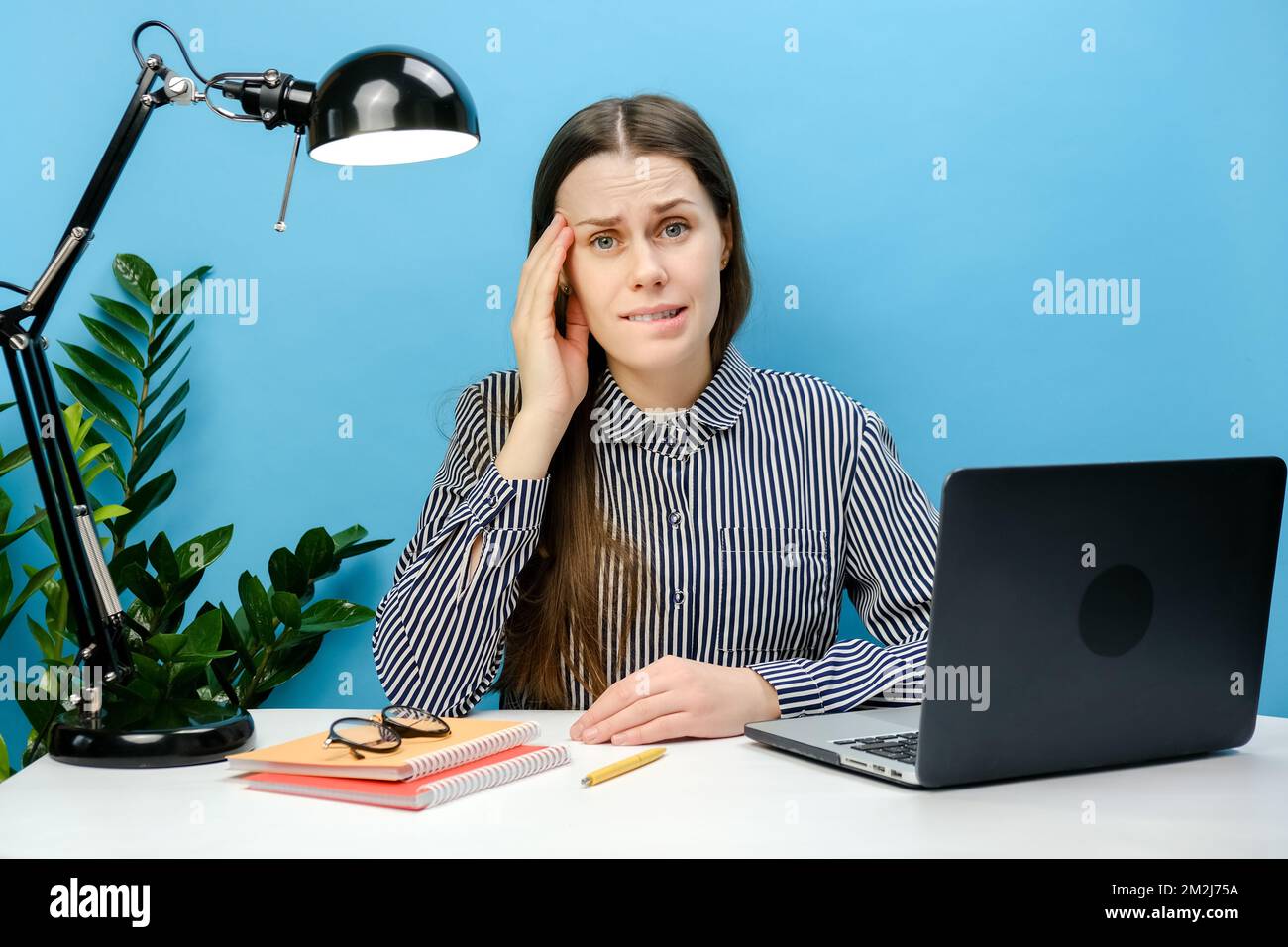 Portrait of confused disappointed troubled secretary employee woman in ...