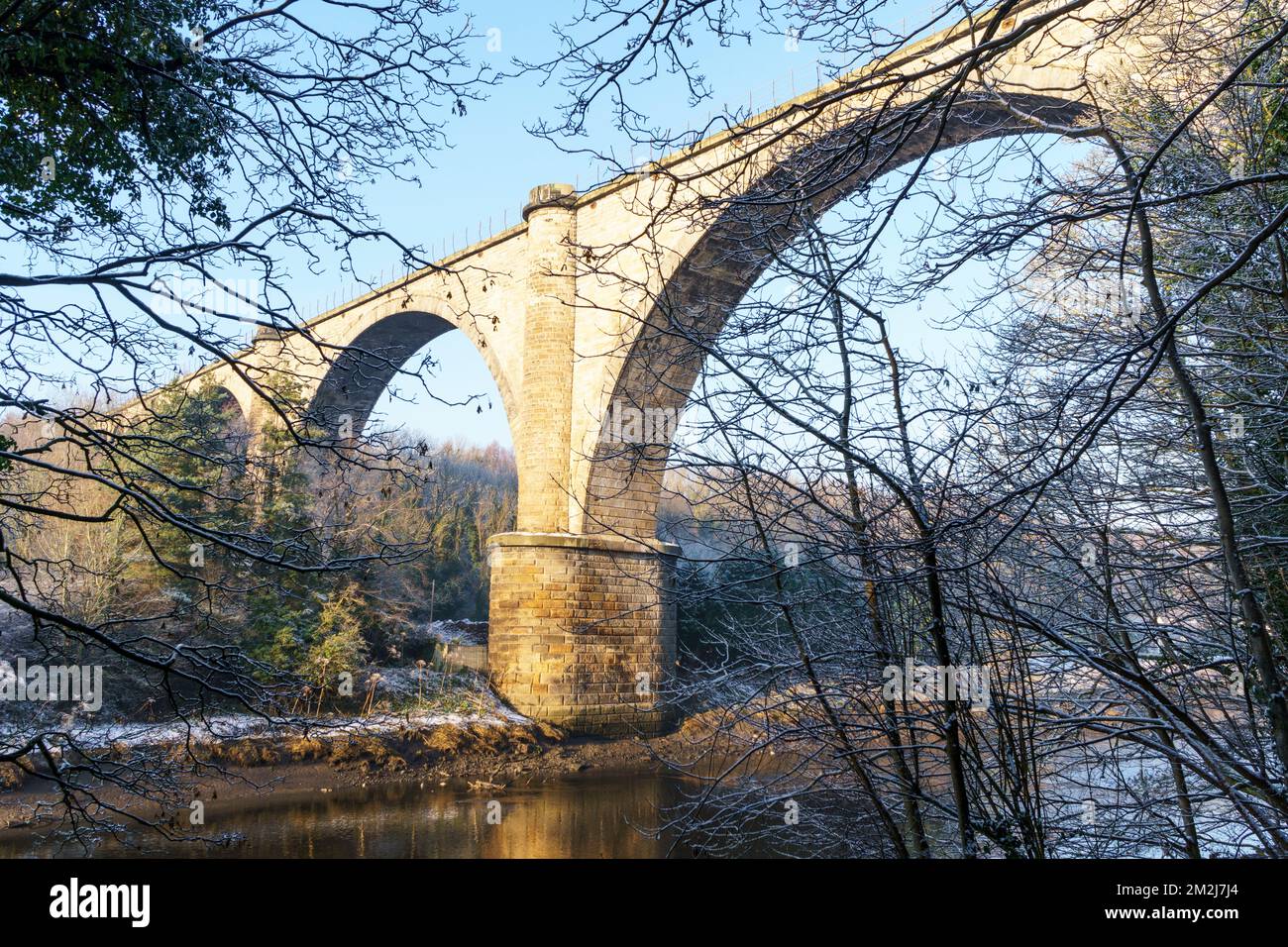 Winter view of the Victoria Viaduct or railway bridge over the river ...