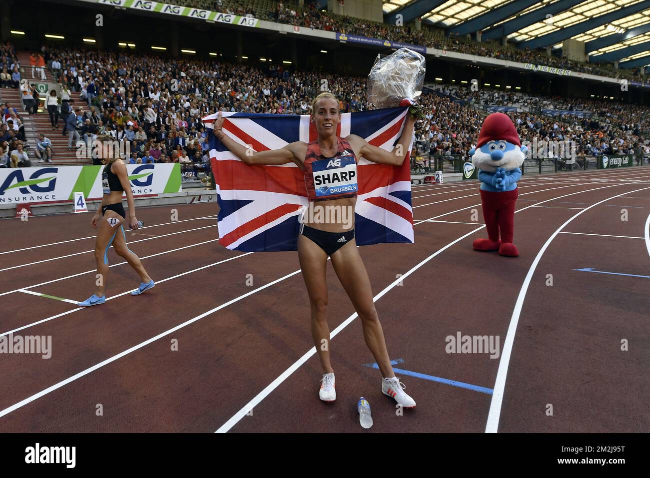 UK's Lynsey Sharp celebrates after winning the women's 800m race at the ...