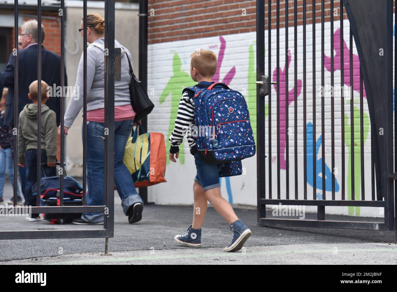 Illustration shows the first day of the new school year at the 'Ecole ...