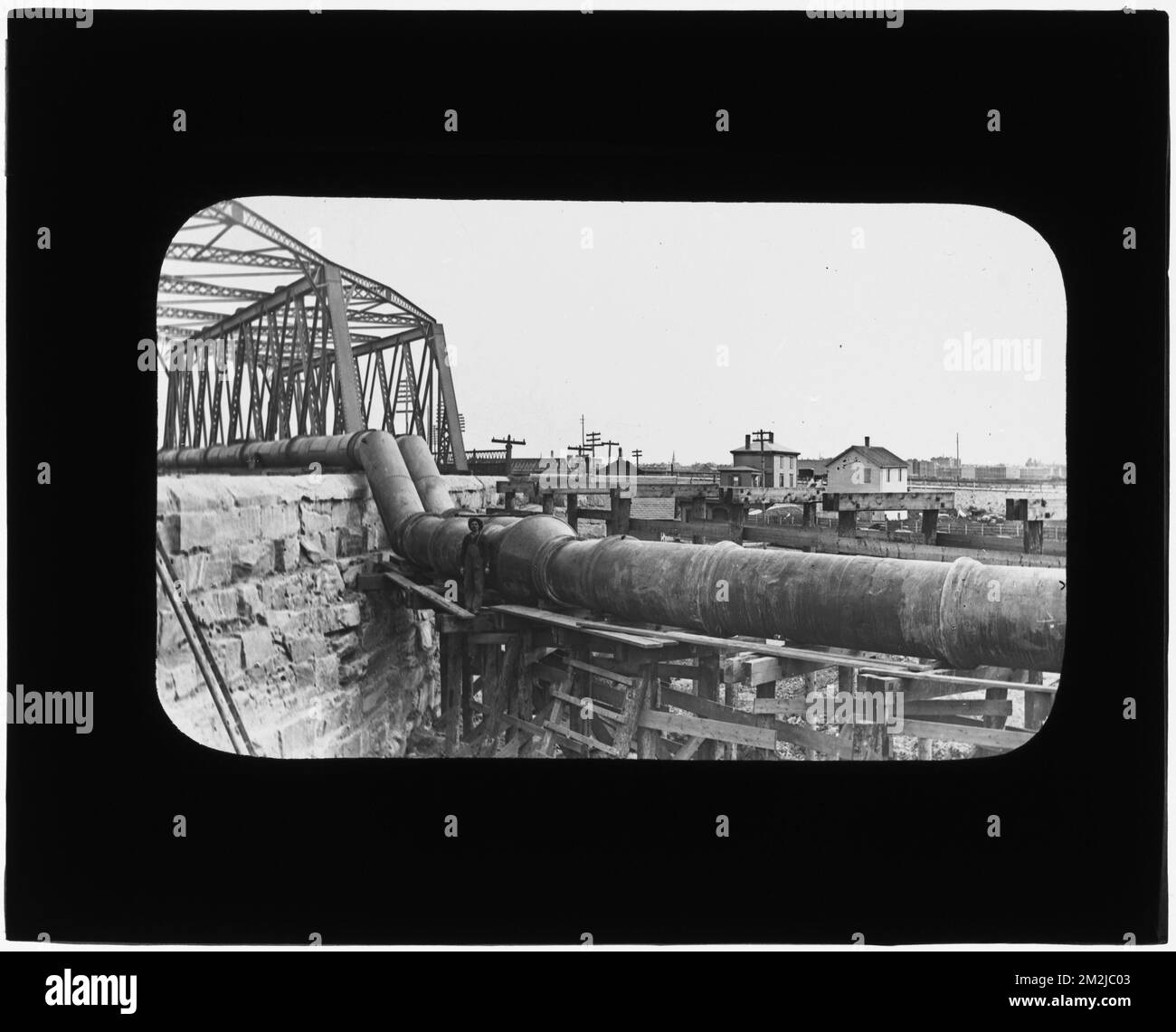 Distribution Department, raising 48-inch pipe, Beacon Street Bridge ...