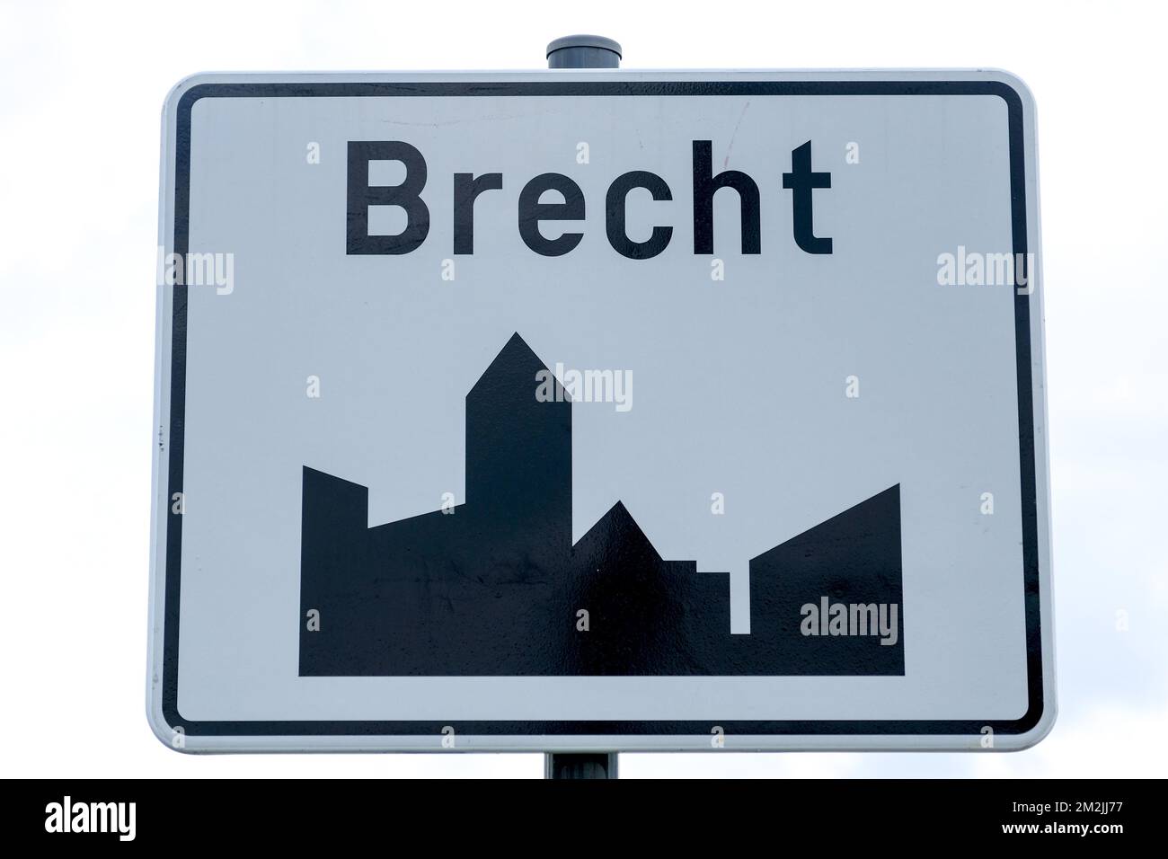 Illustration shows the name of the Brecht municipality on a road sign ...