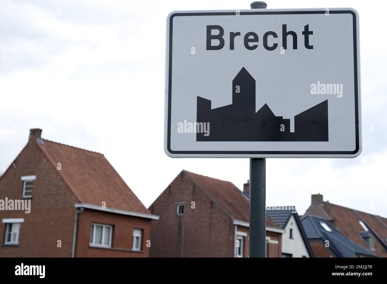 Illustration shows the name of the Brecht municipality on a road sign ...