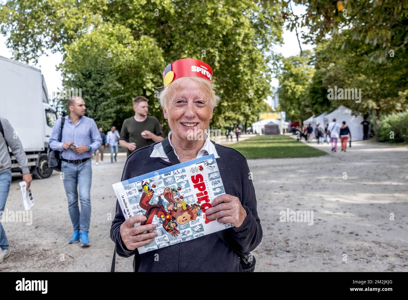 Illustration shows people at the ninth edition of Brussels comic strip ...