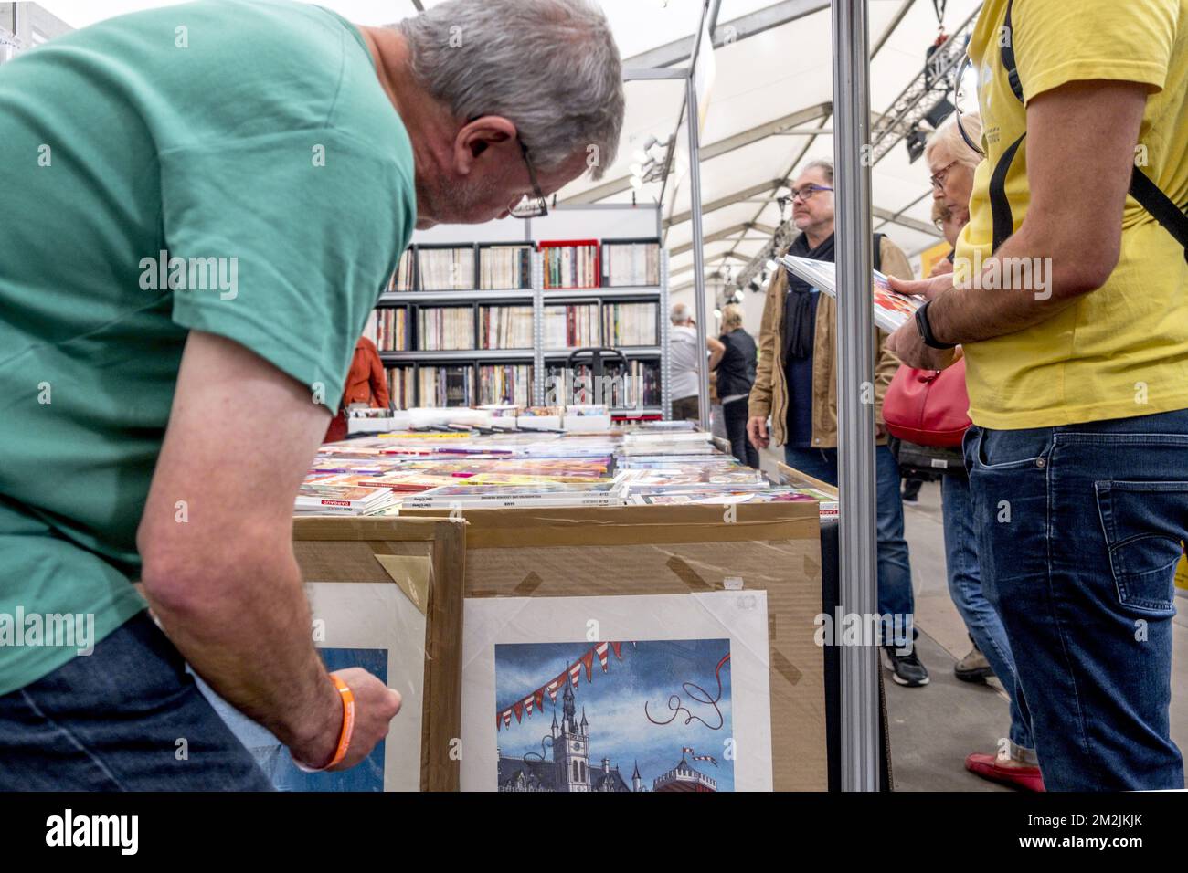 Illustration shows people at the ninth edition of Brussels comic strip ...