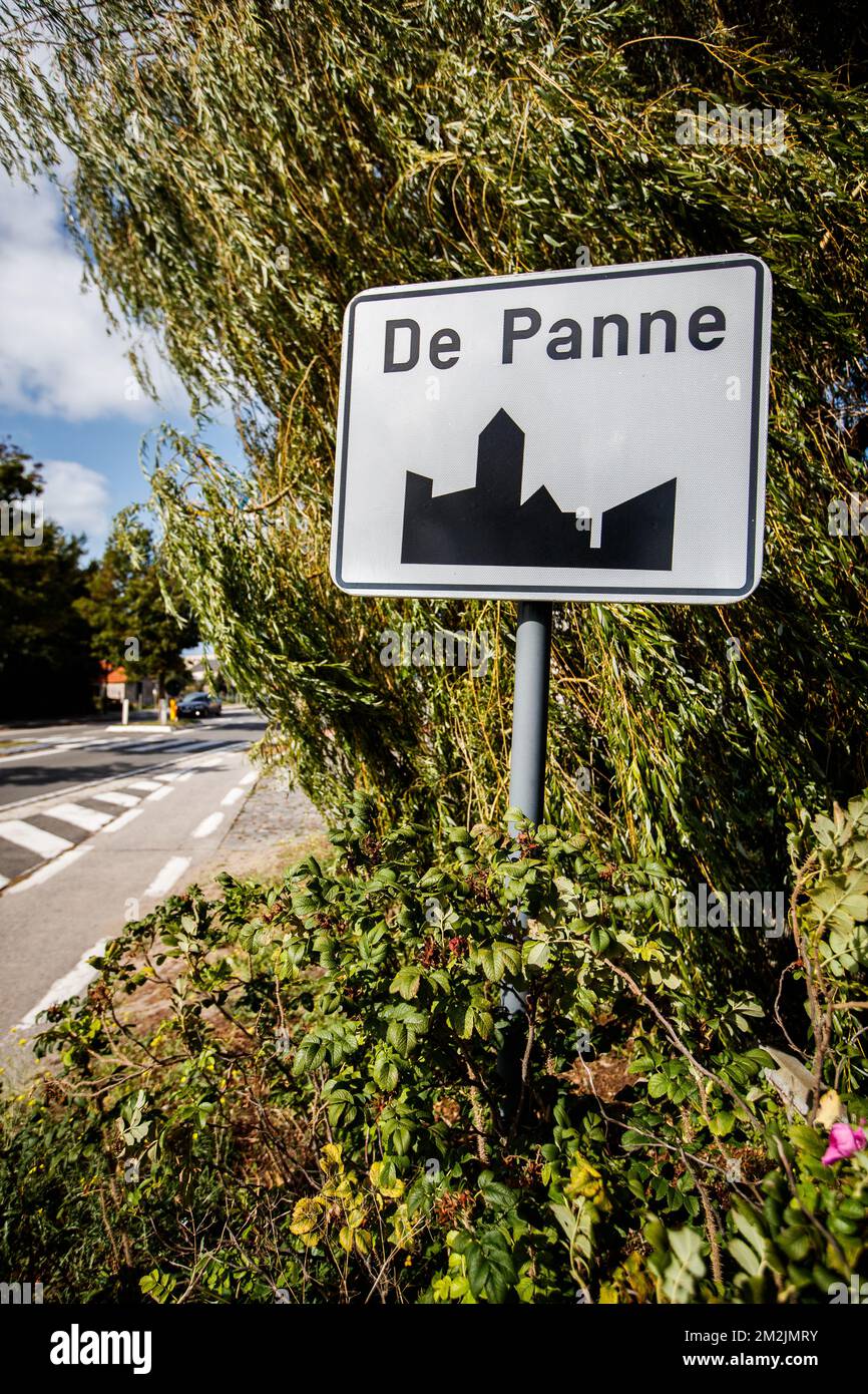 Illustration shows the name of the De Panne municipality on a road sign ...