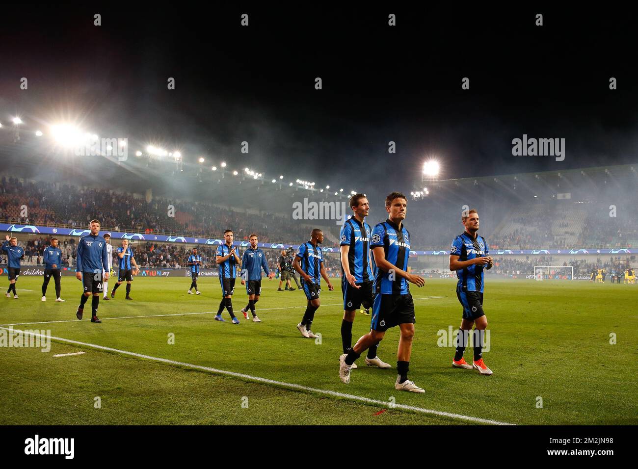 Club's players look dejected after a game between Belgian soccer team ...