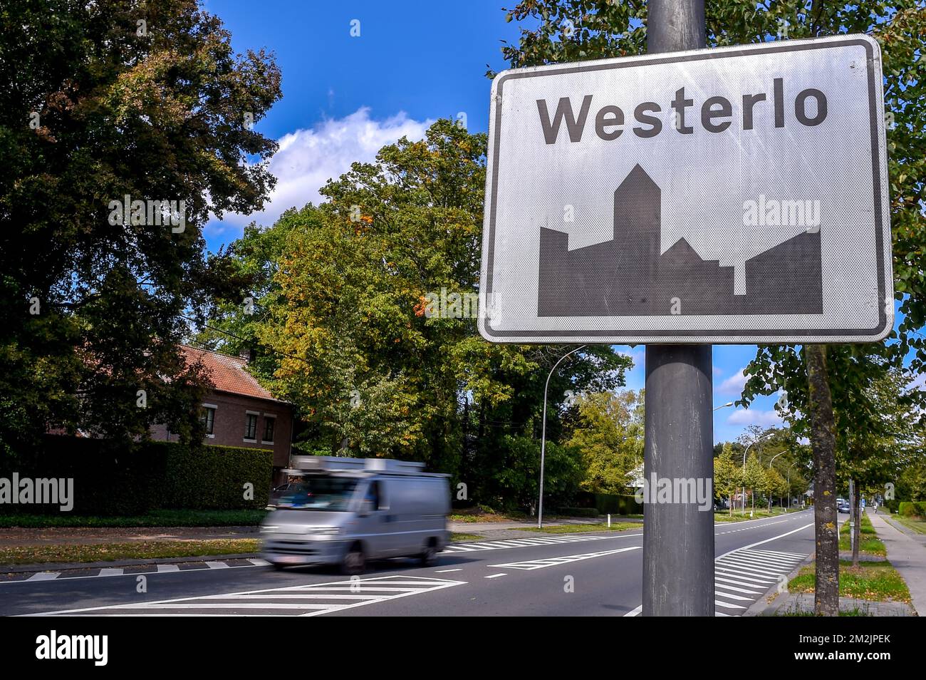 Illustration shows the name of the Westerlo municipality on a road sign ...