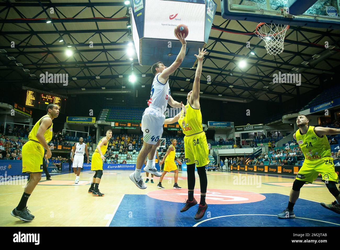 Mons' Andrew Chrabascz and Oostende's Marin Maric pictured in action ...