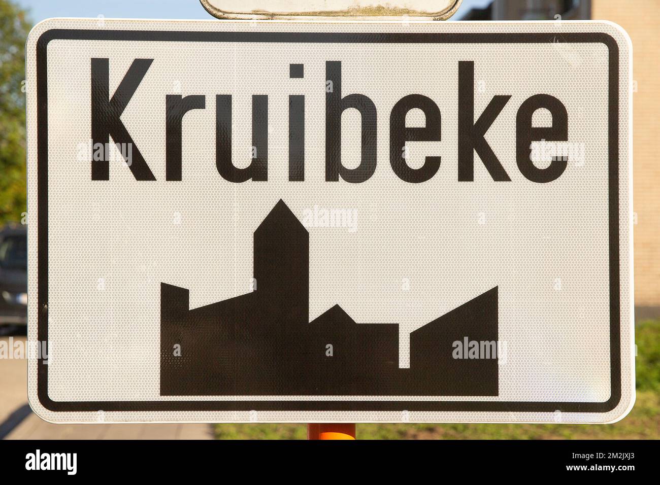 Illustration shows the name of the Kruibeke municipality on a road sign ...