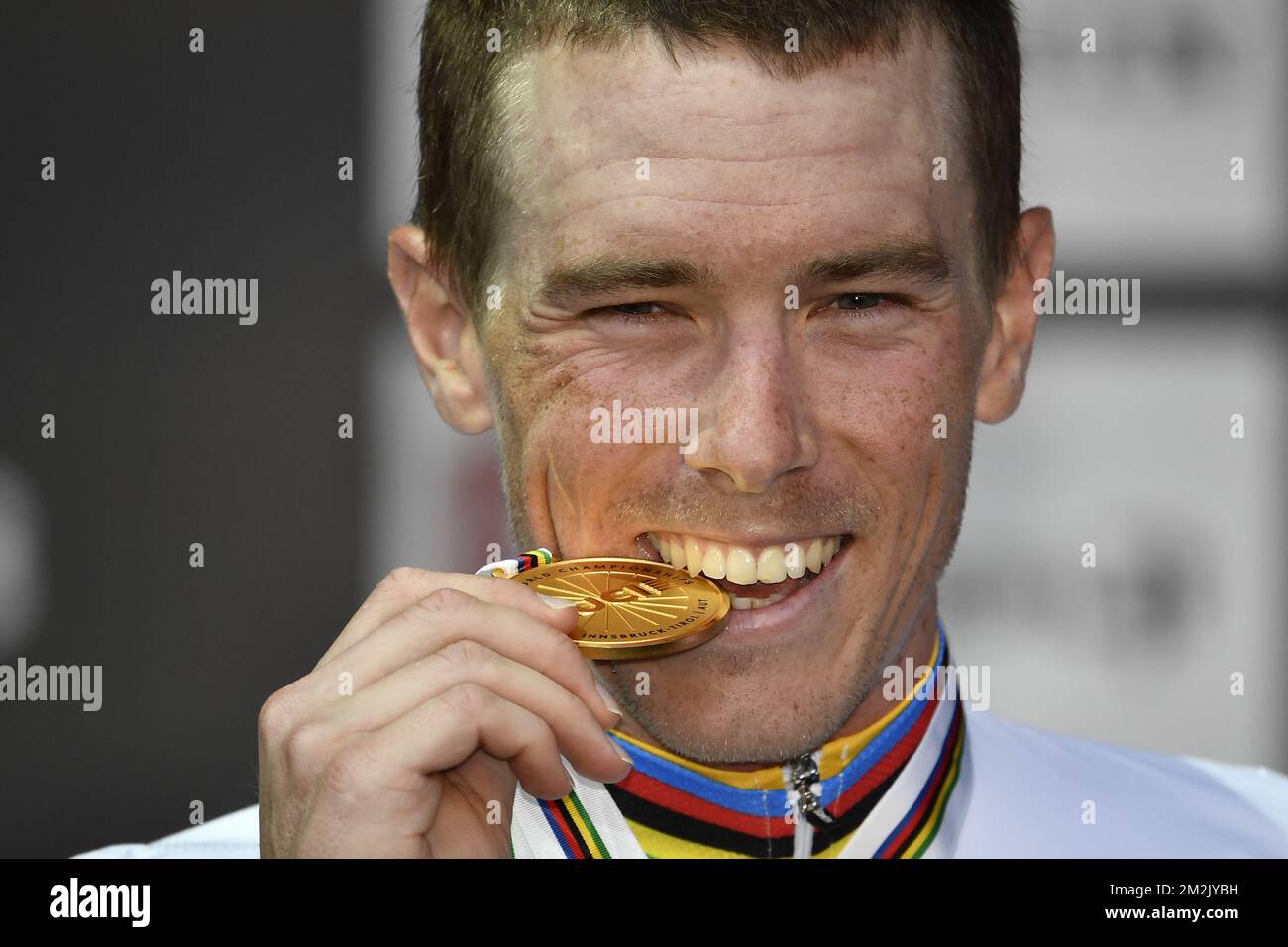 Australian gold medalist Rohan Dennis celebrates on the podium of the ...
