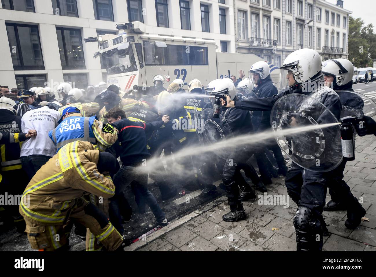 Riot police pictured using pepper spray at a demonstration of the ...