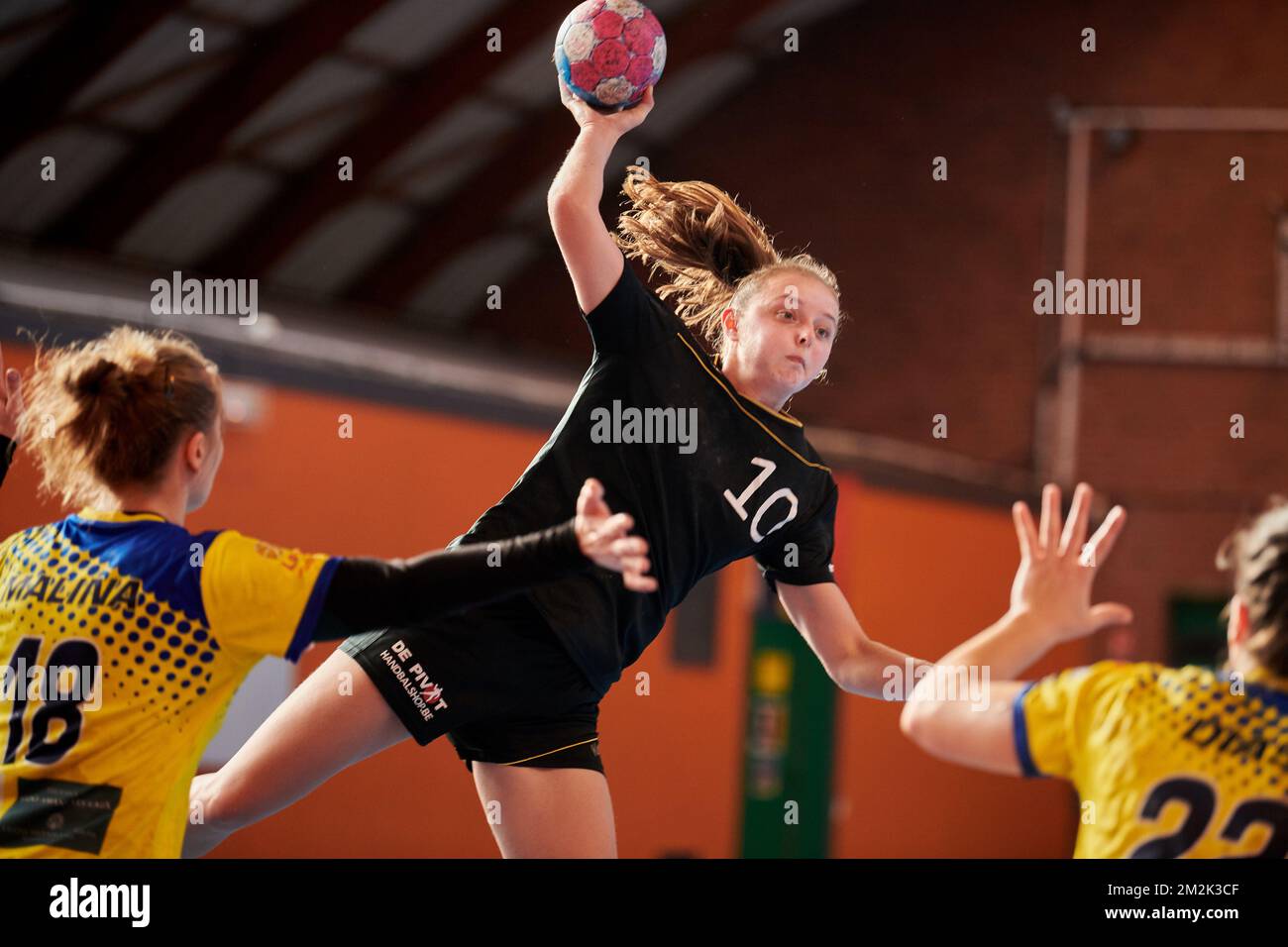 This handout picture, distributed by the Handball Union shows Nele Antonissen in action the ...