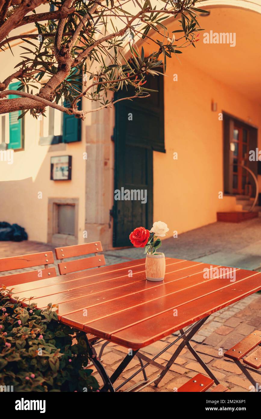 Empty cafe terrace with white table and chair. exterior of the cafe ...