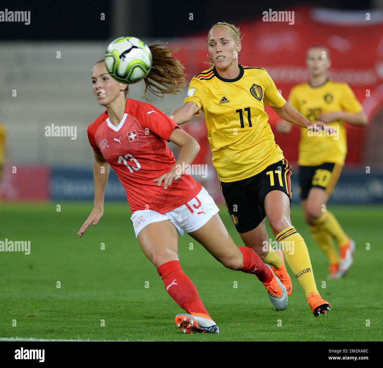 Switzerland's midfielder Lia Walti and Belgium's Janice Cayman pictured ...