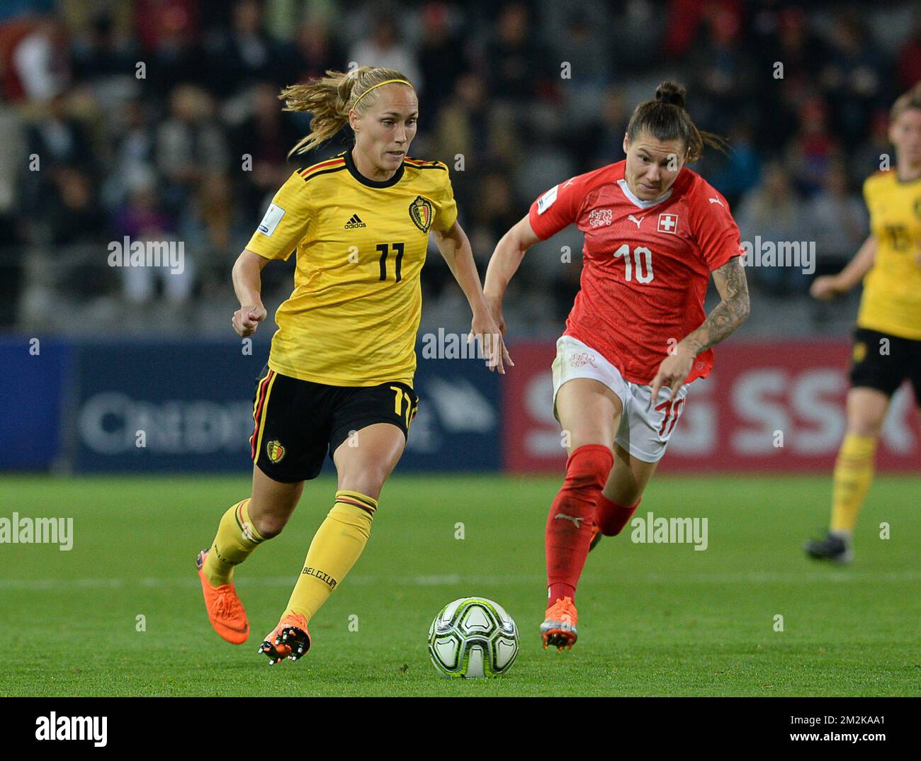 Belgium's Janice Cayman and Switzerland's forward Ramona Bachmann ...