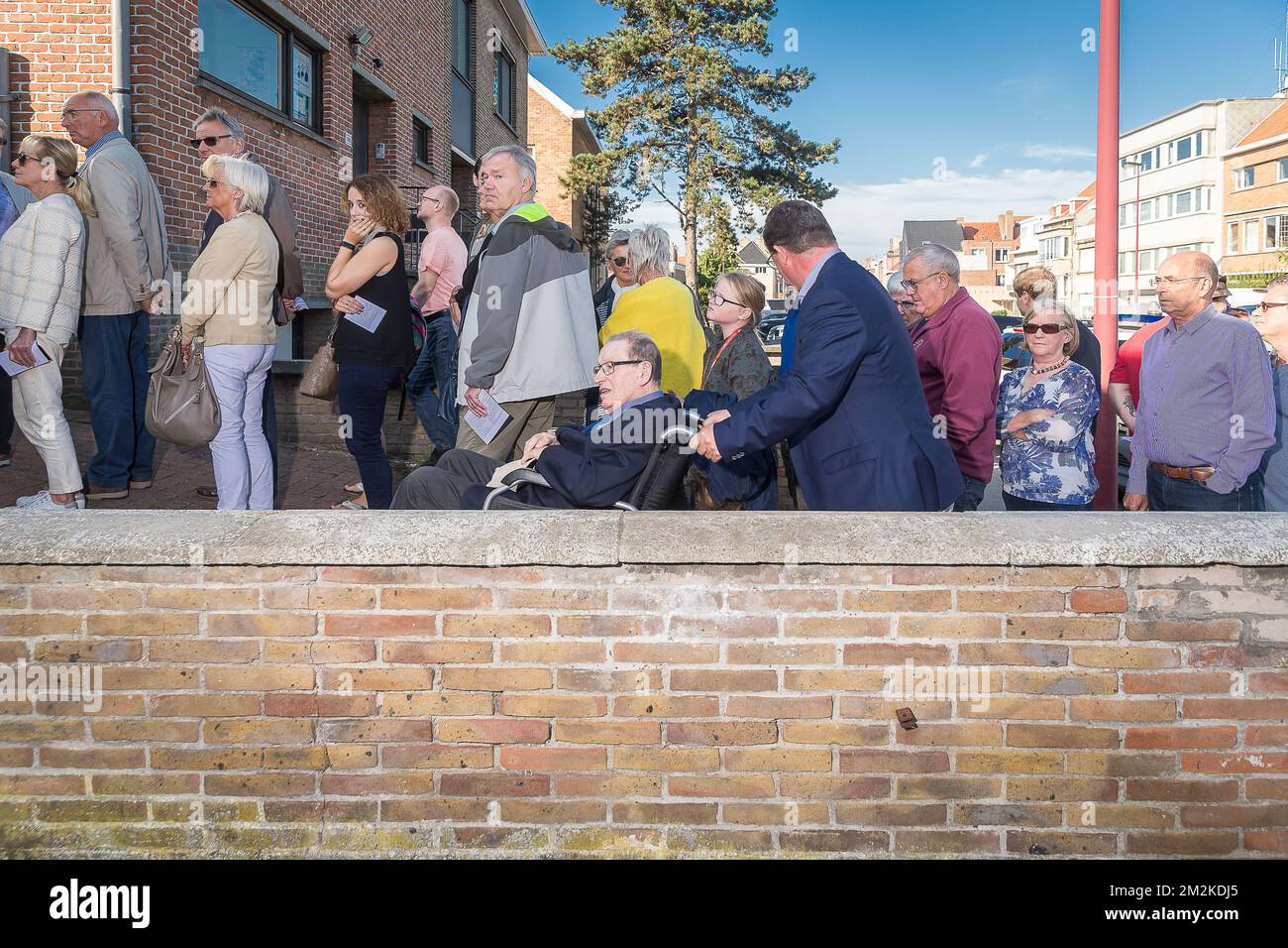 Bart Tommelein and his father arrive to vote at a polling station in ...