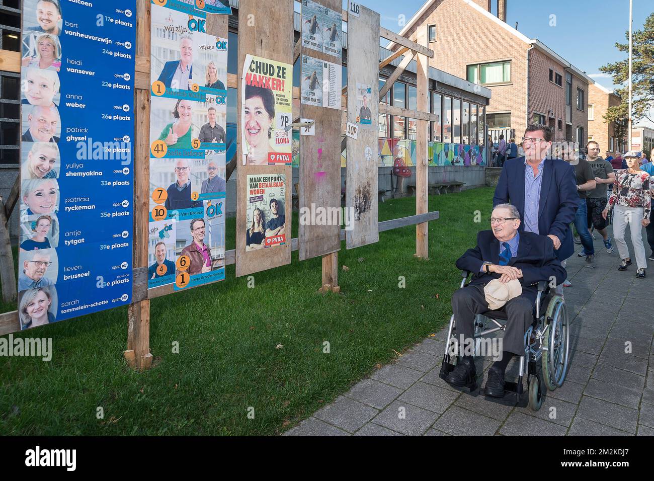 Bart Tommelein and his father arrive to vote at a polling station in ...