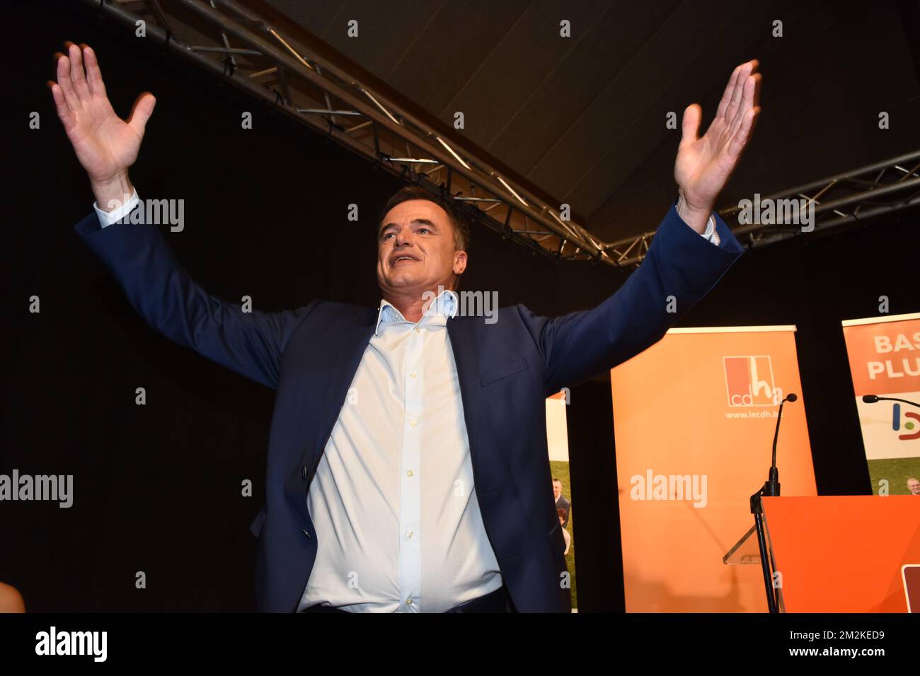 cdH's Benoit Lutgen celebrates at a party meeting on the evening after ...
