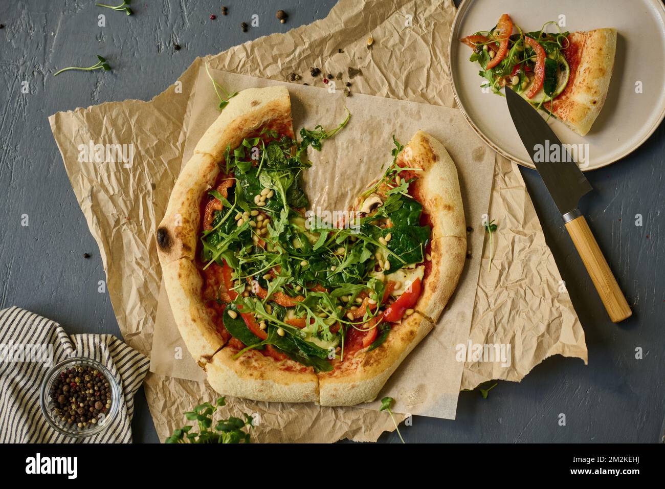 High angle view of italian pizza with vegetables and greens Stock Photo ...